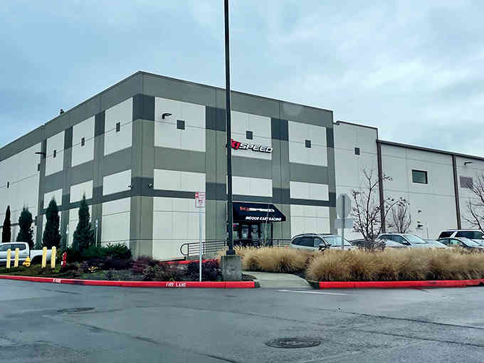 The building's exterior might look industrial, but inside awaits pure adrenaline wrapped in safety gear and friendly competition.