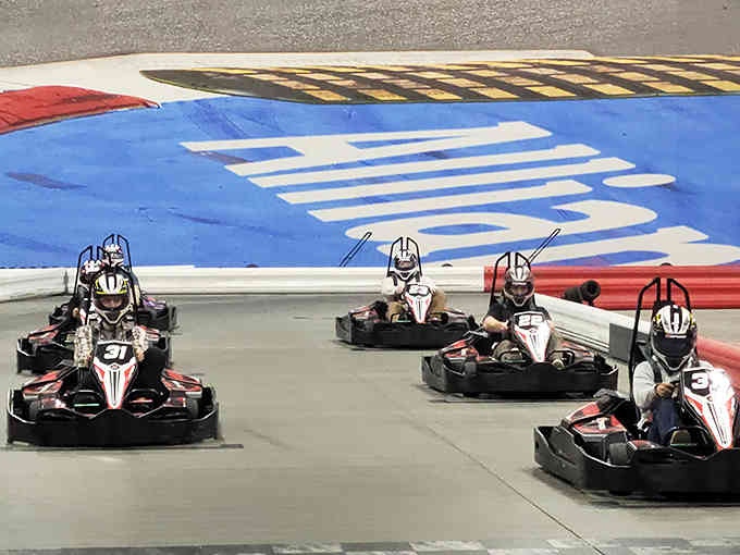 Racing side-by-side on a track that looks like it belongs in a video game come to life.