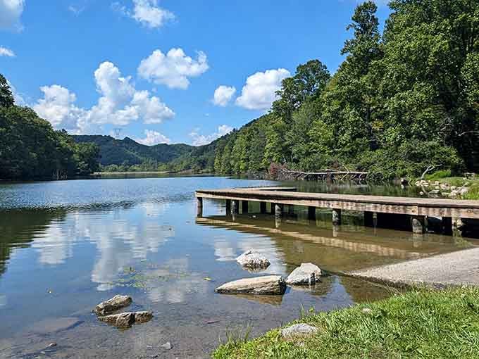 Crystal-clear water meets mountain majesty at this lakeside paradise that puts your screensaver to shame.