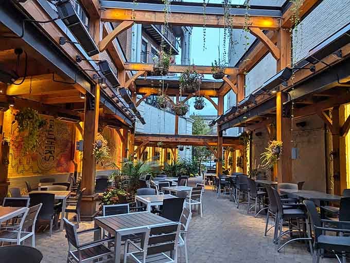 That timber frame patio glowing at dusk proves some architectural decisions are just objectively correct and beautiful.