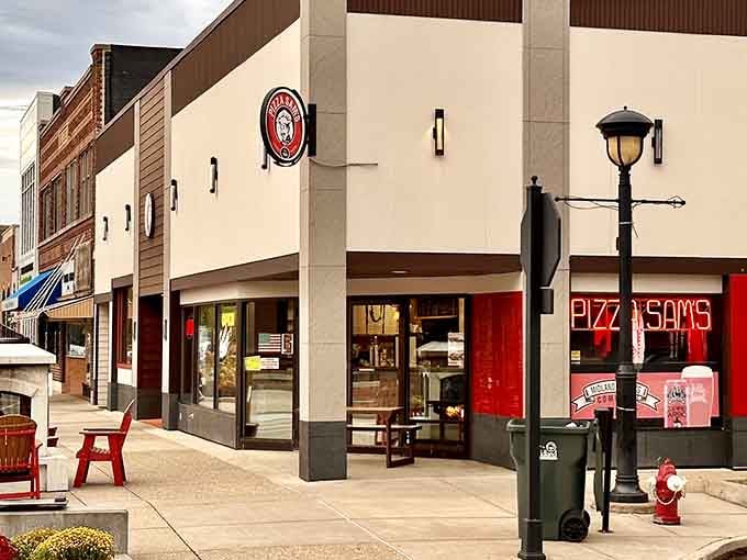 That unassuming storefront is where pizza dreams come true, proving the best things never need to shout.