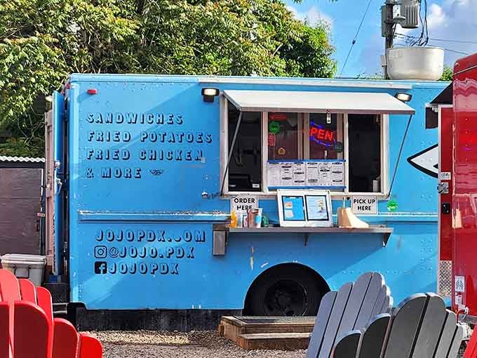 That cheerful blue truck isn't just transportation—it's your ticket to fried chicken paradise on wheels.