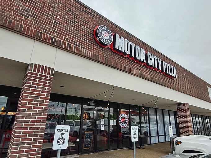 That brick facade and bold signage announce Detroit-style pizza has officially landed in Texas, y'all.