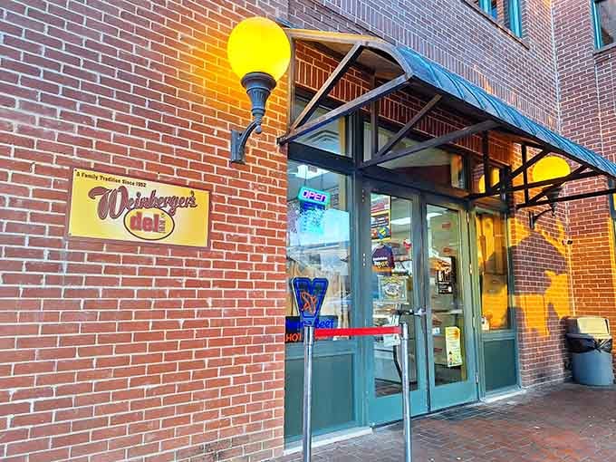 That brick corner building with the cheerful yellow sign is your gateway to sandwich enlightenment in downtown Grapevine.