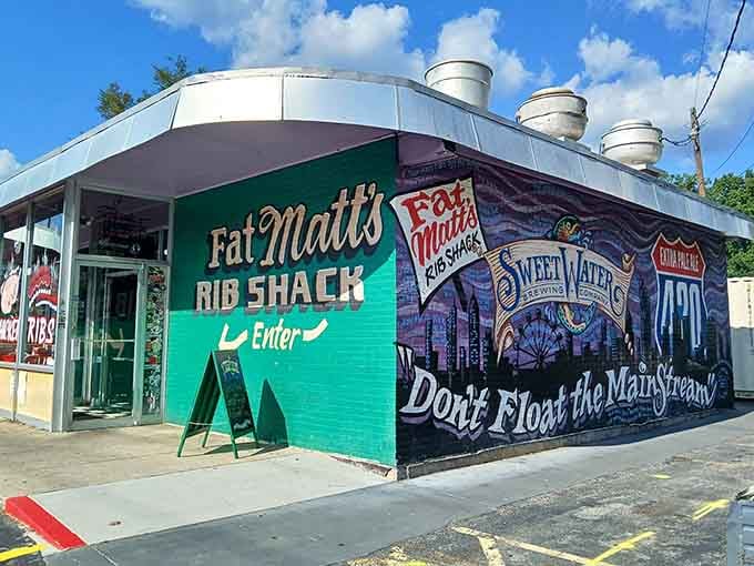 The mural says "Don't Float the Mainstream," which is perfect advice when you've found ribs this extraordinary.
