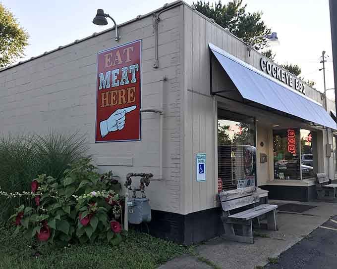 That "EAT MEAT HERE" sign doesn't mess around with subtlety, and honestly, we respect the straightforward approach to life's important decisions.