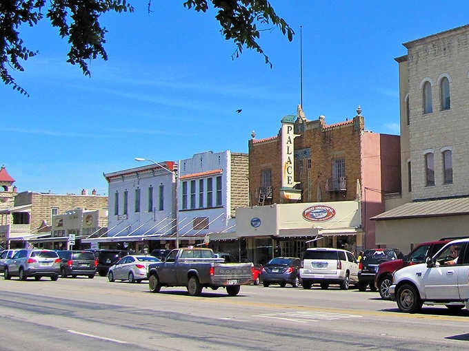 Main Street architecture tells stories of German heritage meeting Texas spirit under endless blue skies.