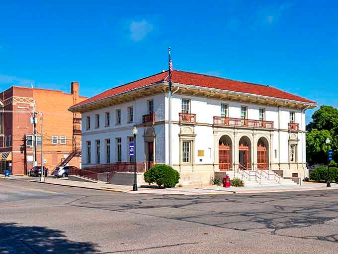 The La Junta Post Office stands like a Spanish Colonial Revival masterpiece, proving government buildings once had actual style.
