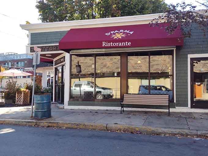 That burgundy awning beckons like a lighthouse for hungry souls seeking authentic Italian comfort in coastal Massachusetts.