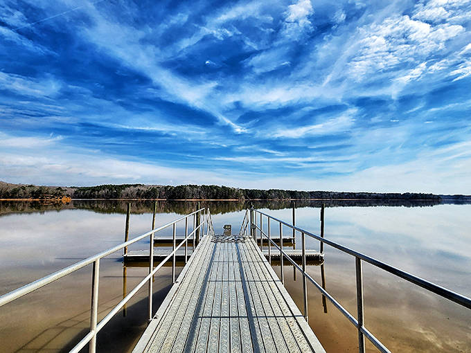 That dock stretches toward infinity like a scene from "The Truman Show," minus the hidden cameras.