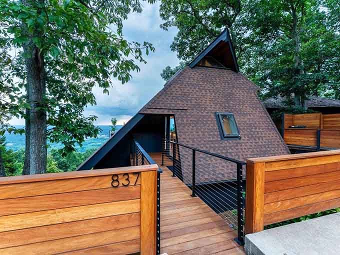 That A-frame silhouette against mountain views is basically architecture's way of saying "I'm here to impress you."