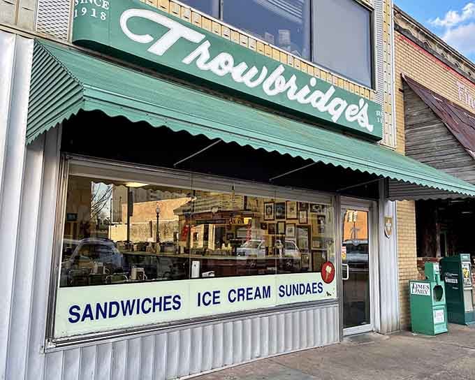 That green awning has been beckoning ice cream lovers since before air conditioning made Alabama summers bearable.