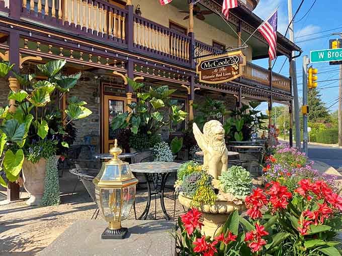 Outdoor seating surrounded by flowers proves that history and hospitality make excellent neighbors in downtown Quakertown.
