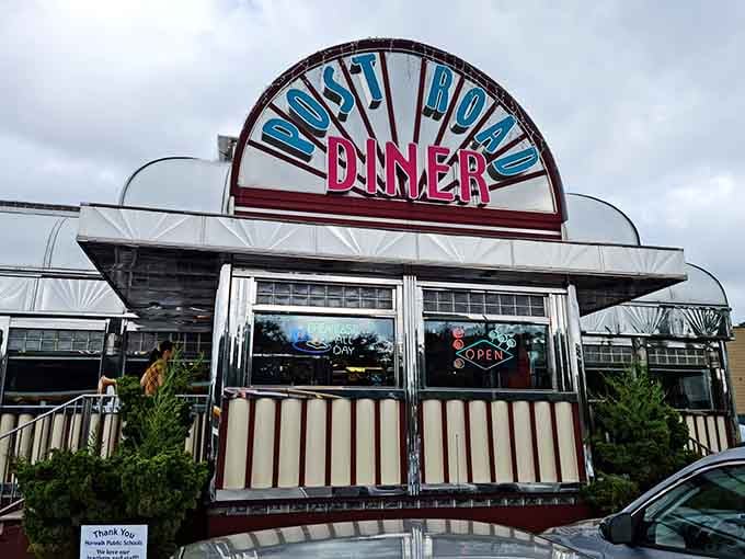 That gleaming chrome exterior isn't just a building, it's a time machine with a neon sign and parking spaces.