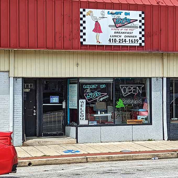 That cheerful retro signage on the red barn exterior promises good times and even better breakfast inside.