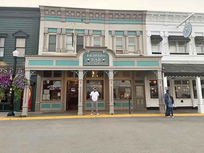 That turquoise and cream facade isn't just pretty, it's practically begging you to come inside and stay awhile.