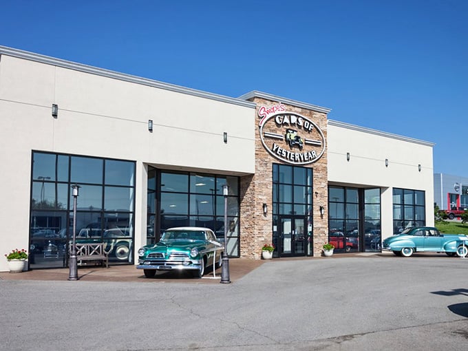That stone facade and vintage signage promise automotive treasures inside, like a jewelry box for car lovers.