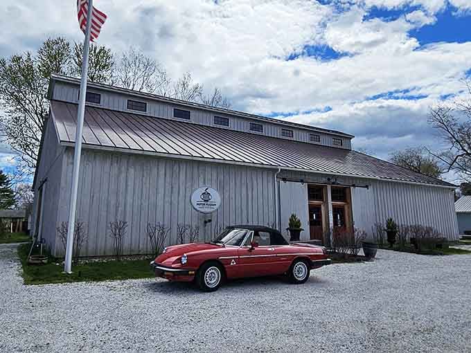 The unassuming entrance belies the automotive wonderland that awaits beyond those welcoming wooden doors.