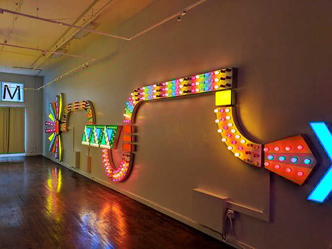 Neon dreams and carnival schemes collide in this explosion of light that makes reality feel wonderfully optional.