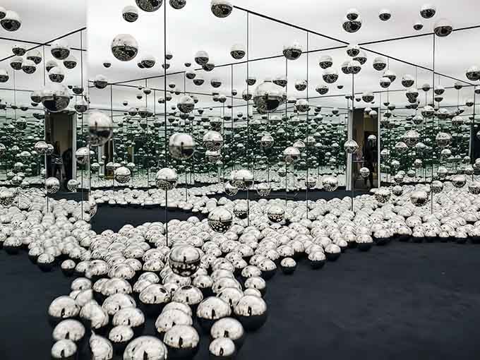 Infinite spheres stretch in all directions, forming a surreal, otherworldly pattern that defies imagination.