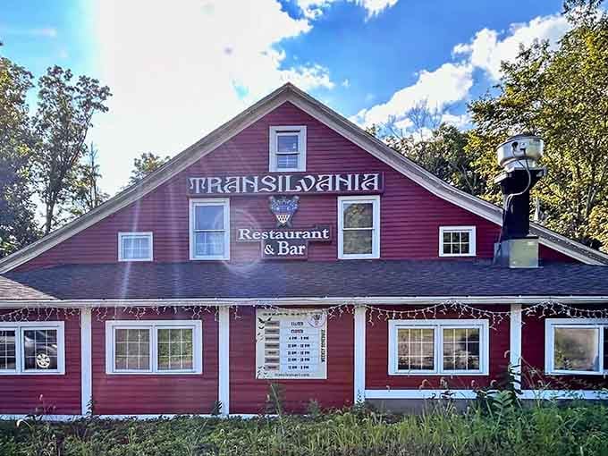 That red barn exterior promises antiques but delivers vampires, proving Connecticut's best surprises hide in plain sight.