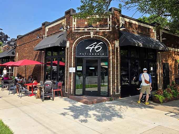 That brick facade and arched entrance aren't just pretty, they're your gateway to buttery French paradise in Minneapolis.
