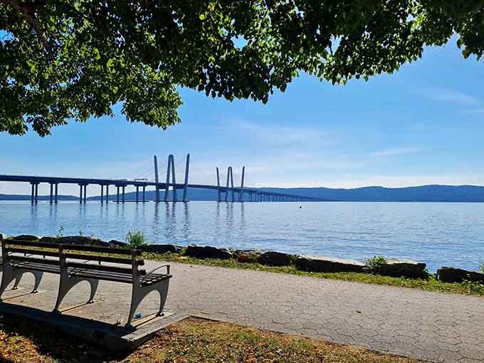 The paved path hugs the shoreline like it was designed by someone who actually walks for pleasure.