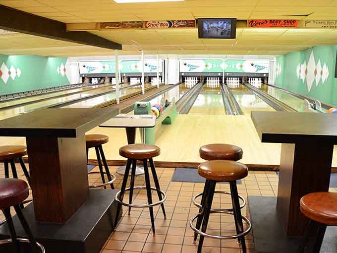 This view perfectly captures the retro charm, where mint-green diamonds and polished lanes create bowling's version of paradise.