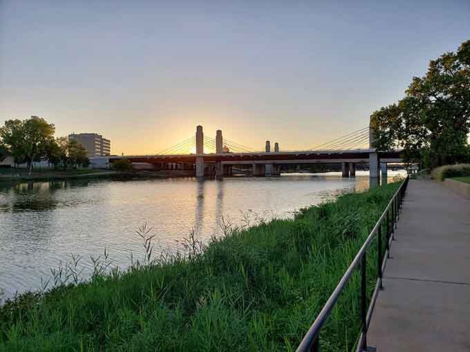 The Brazos River puts on a sunset show that costs nothing but delivers everything you need.