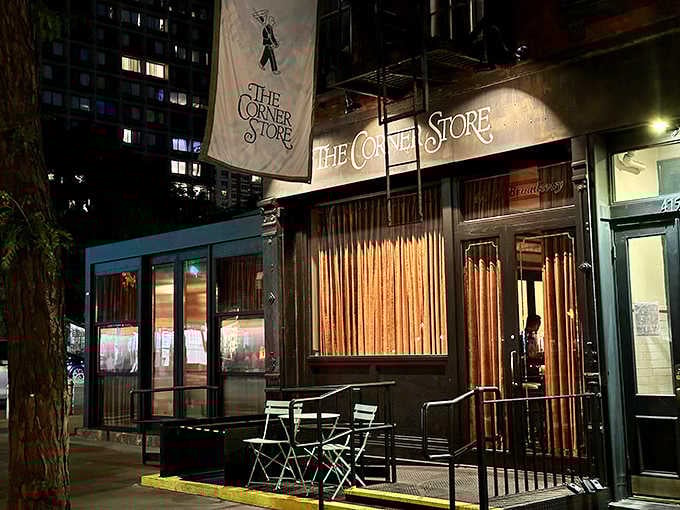 That unassuming entrance hides one of SoHo's hottest dining destinations, where velvet curtains guard culinary treasures within.