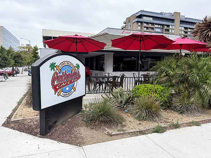 That cheerful sign and those red umbrellas aren't just decoration, they're your first hint that breakfast moderation ends here.