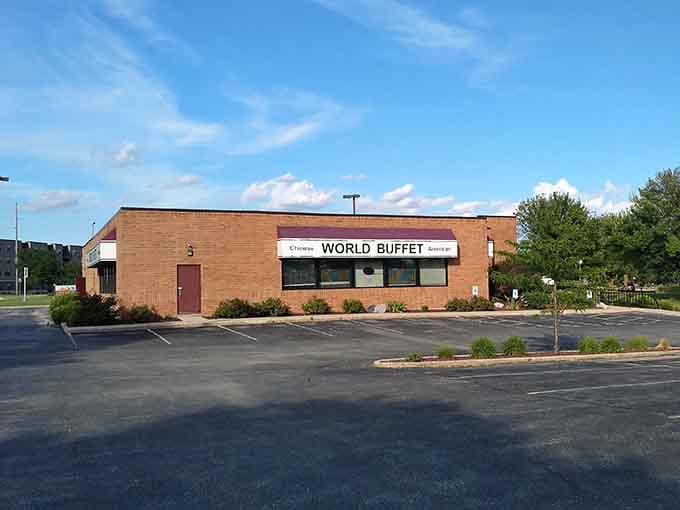 The unassuming brick exterior hides a treasure trove of unlimited eating possibilities just beyond those doors.