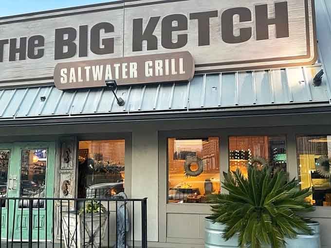 That weathered wood sign isn't just decoration – it's a promise of the coastal escape waiting inside.