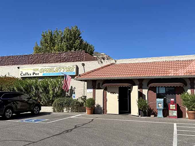 That giant "101 OMELETTES" sign isn't just advertising&mdash;it's a promise of salvation and serious breakfast ahead.