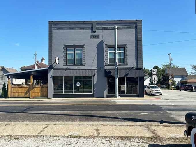This unassuming corner building looks quiet—but you just know something special’s cooking behind those shaded windows.