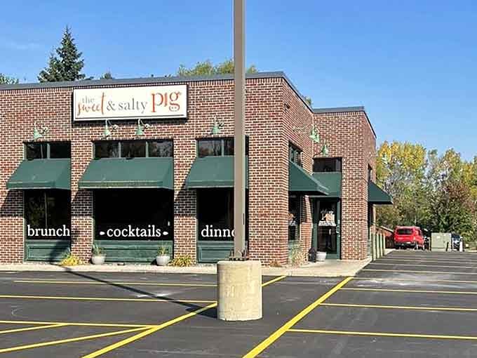 That brick exterior with the cheerful awnings promises good things are happening inside, and they absolutely are.
