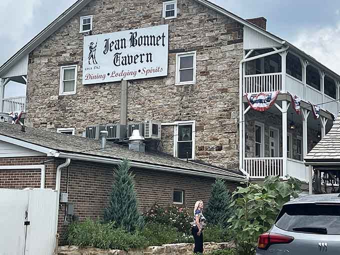 That stone facade has witnessed more American history than most textbooks, and it's still serving dinner nightly.
