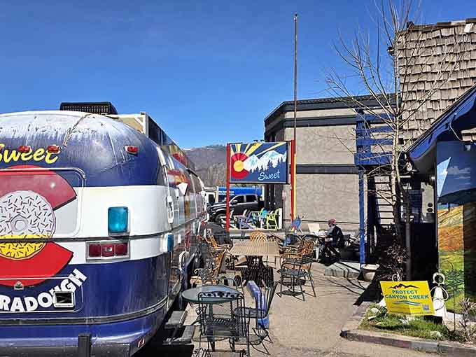 Outdoor tables perfect for people-watching while you contemplate ordering just one more donut for the road.