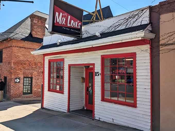 That cheerful red and white exterior is your beacon to fried chicken paradise in downtown Ypsilanti.