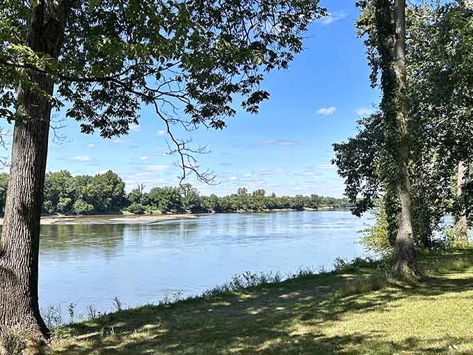 The Wabash River flows peacefully past Harmonie, proving Indiana's got more water views than just Lake Michigan.