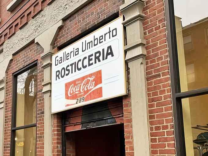 The vintage Coca-Cola sign and simple storefront prove that the best food doesn't need flashy marketing.