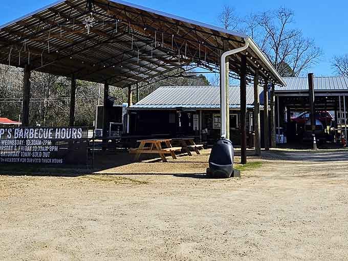 The egg smoker sitting there like a trusty sidekick tells you everything about the serious business happening here, where patience and smoke create pure magic.