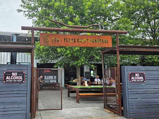 That entrance isn't just a gateway; it's a portal to smoky, meaty paradise in Scott's Addition.