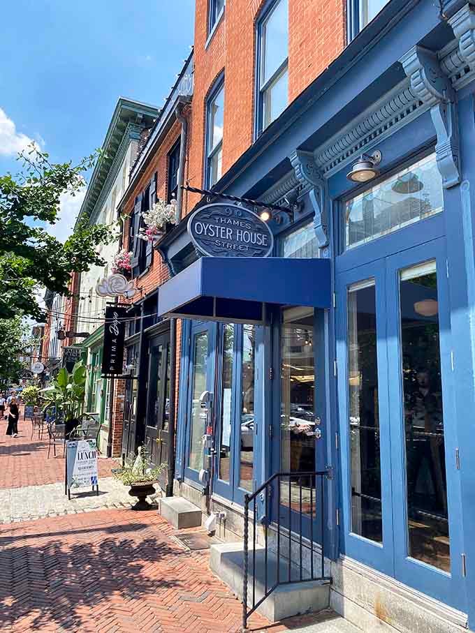 That cheerful blue facade isn't just pretty, it's basically a lighthouse guiding hungry seafood lovers to salvation.