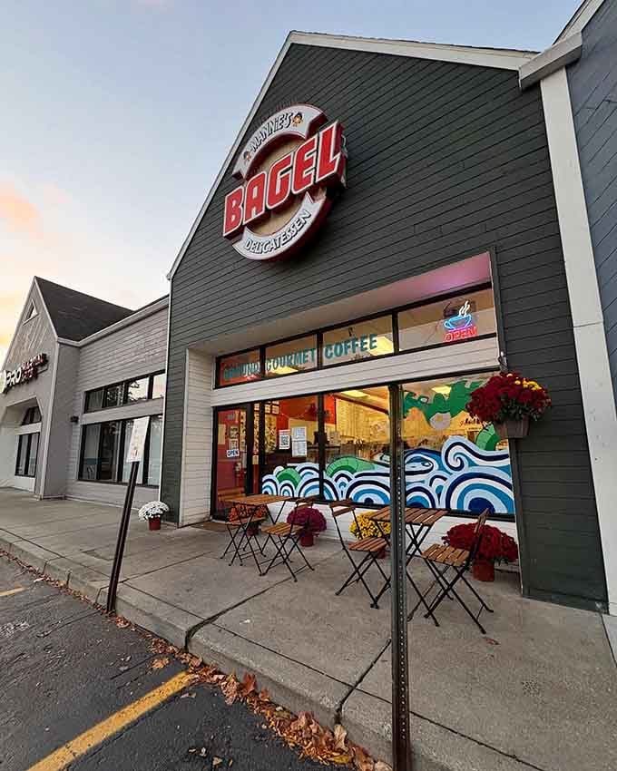 That charming storefront is your beacon to bagel bliss, calling you home like a carb-loving lighthouse.