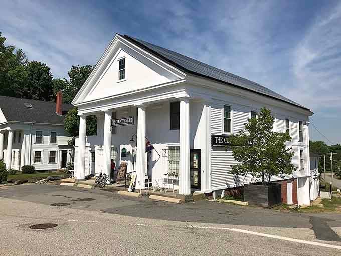 Classic white columns and timeless charm make this building look like it stepped out of a Capra film.