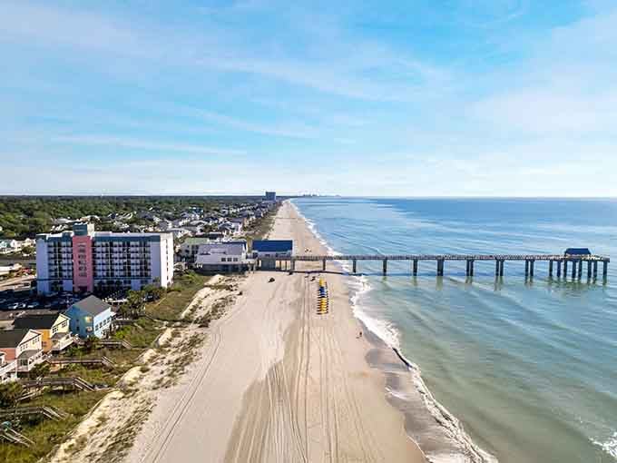 That pristine stretch of sand goes on forever, like someone hit the "extend beach" button and forgot to stop.
