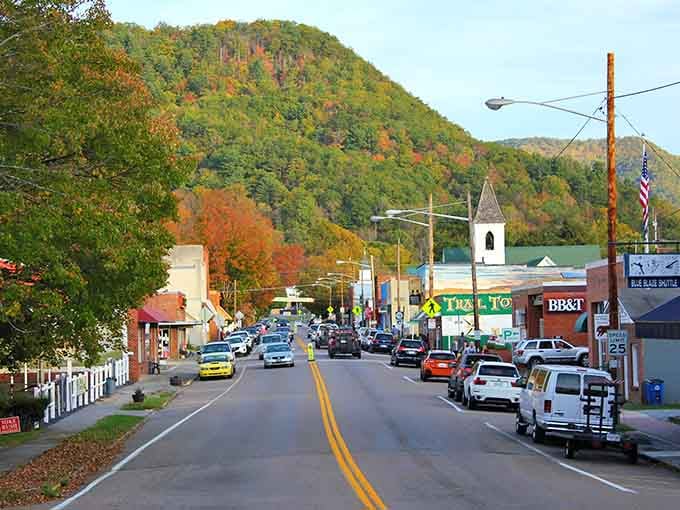 Mountains frame Main Street like nature's own welcome committee, complete with a church steeple and fall colors.