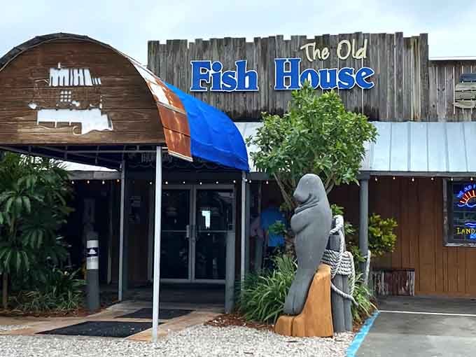 That manatee statue out front isn't just decoration, it's a promise of the waterfront magic waiting inside.