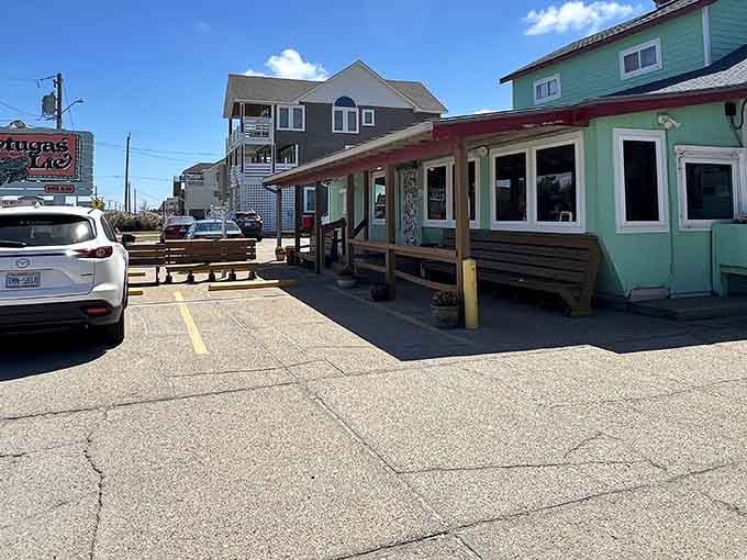 That mint-green exterior isn't just paint &ndash; it's a promise of the tropical escape waiting inside.